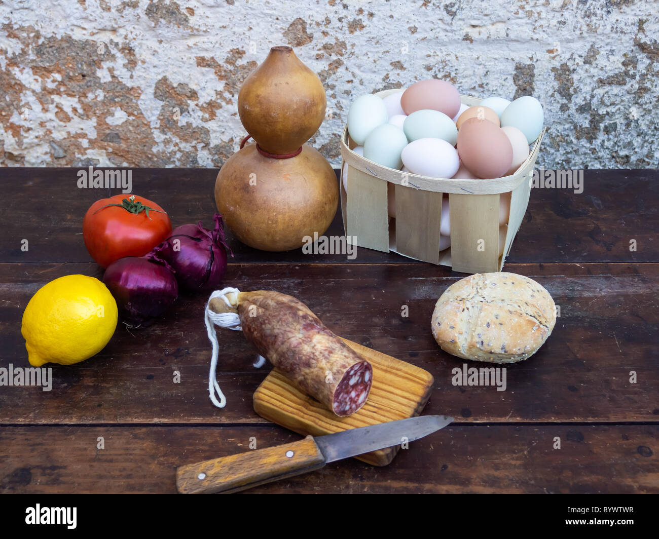 Traditional spanish food on an old wooden table, Iberian pork sausages ...