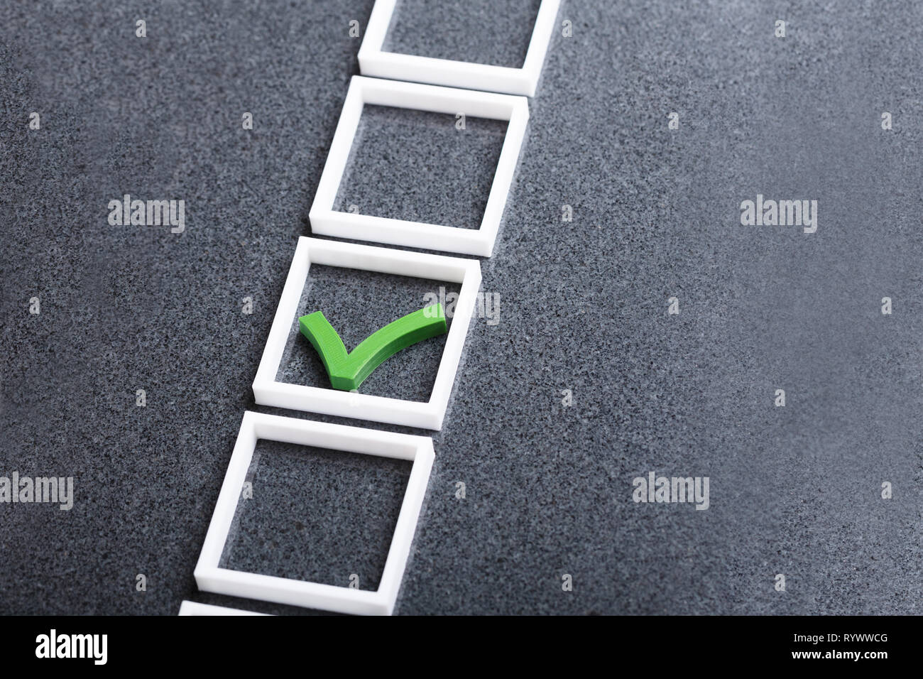 An Elevated View Of Green Check Mark In Checkbox On Gray Background ...