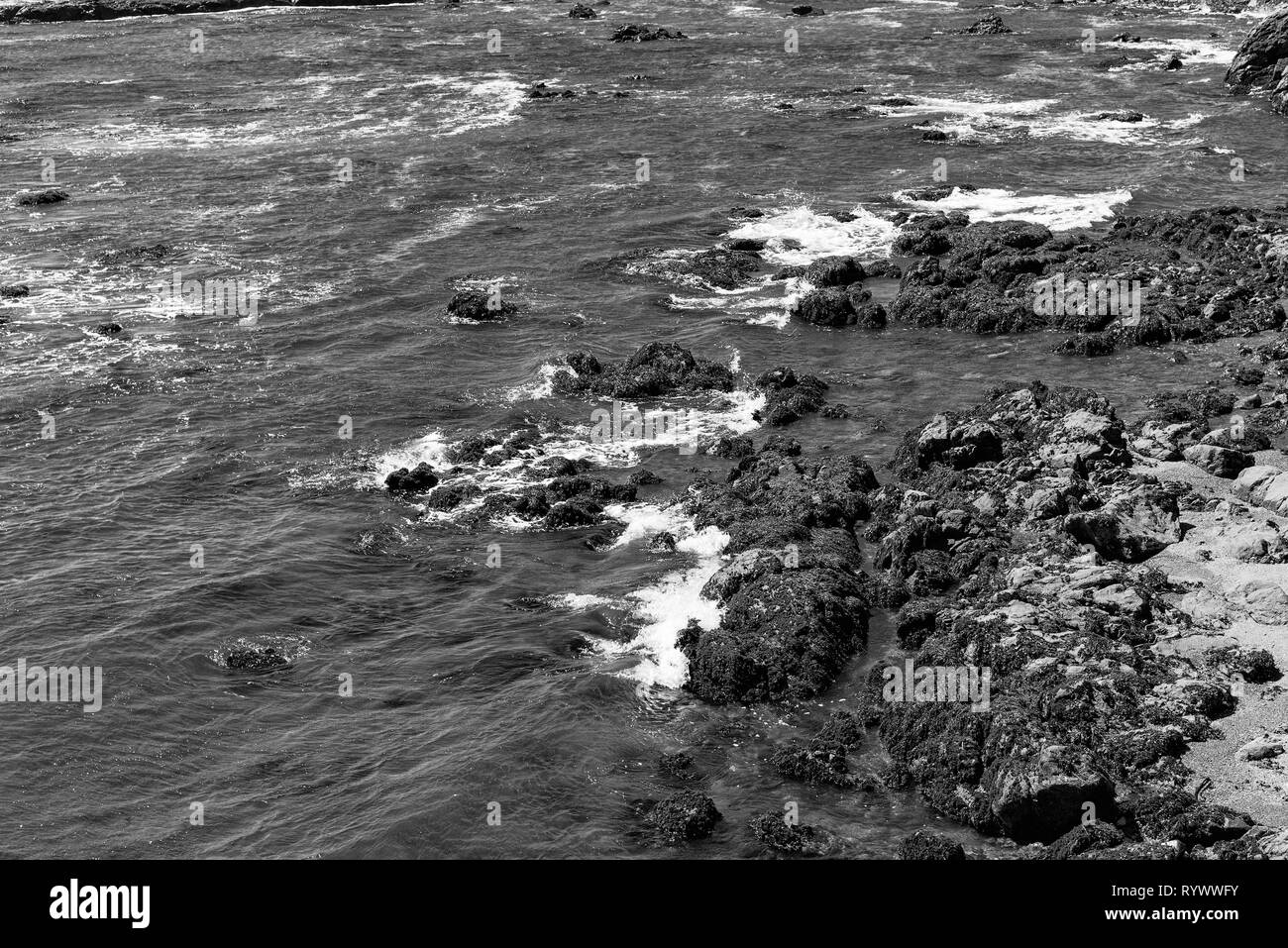 Ocean waves crashing rocky shoreline hi-res stock photography and ...