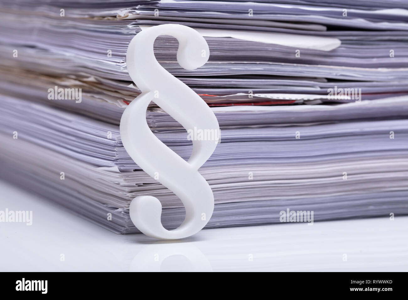 Close-up Of Red Paragraph Symbol Leaning On Documents Stock Photo - Alamy