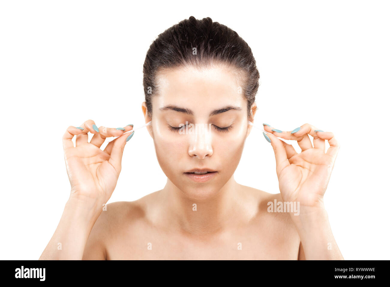girl cleaning her ears with cotton sticks Stock Photo - Alamy