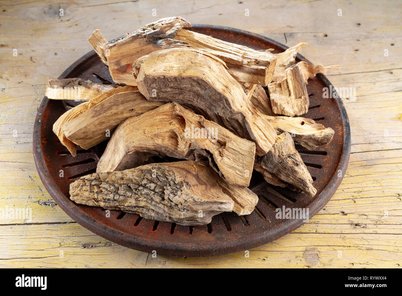Sacred wood "palo santo" - Bursera graveolens,on rustic wood background ...