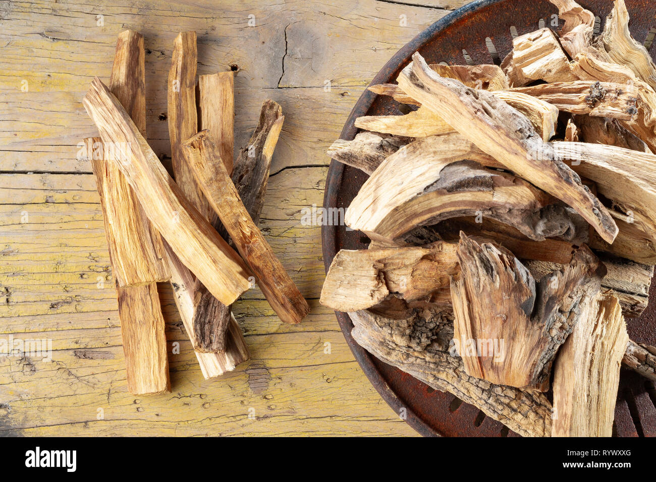 Sacred wood "palo santo" - Bursera graveolens,on rustic wood background ...