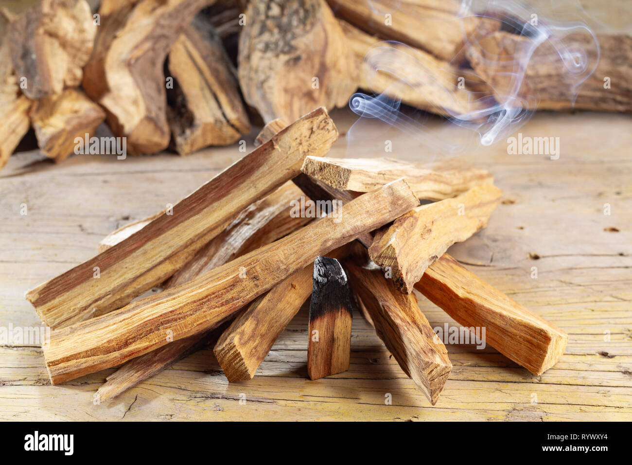 Sacred wood "palo santo" - Bursera graveolens,on rustic wood background ...