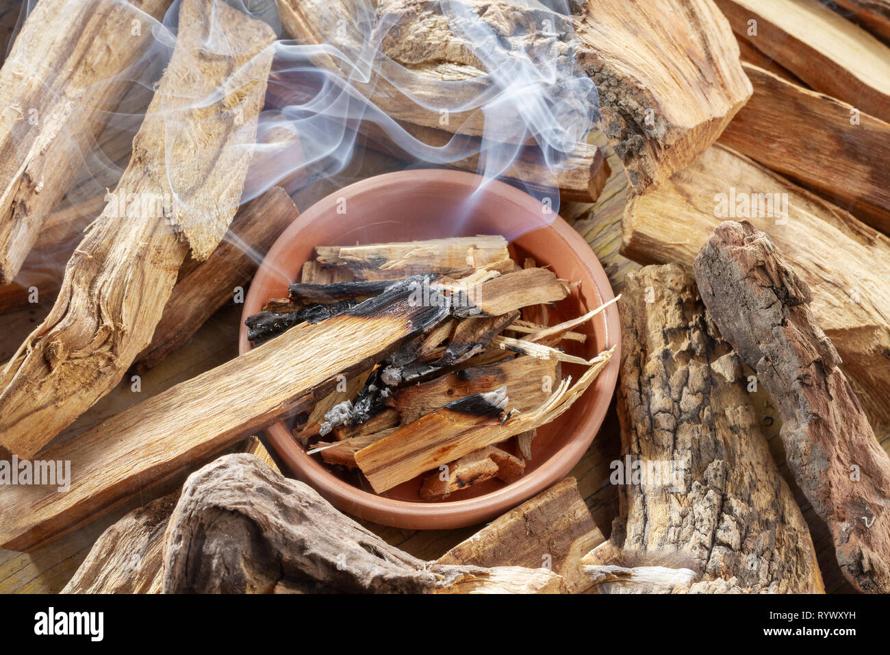 Sacred wood "palo santo" - Bursera graveolens,on rustic wood background ...