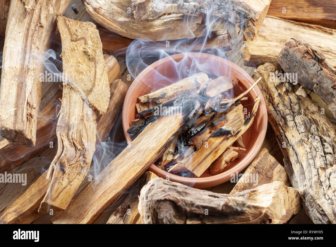 Sacred wood "palo santo" - Bursera graveolens,on rustic wood background ...