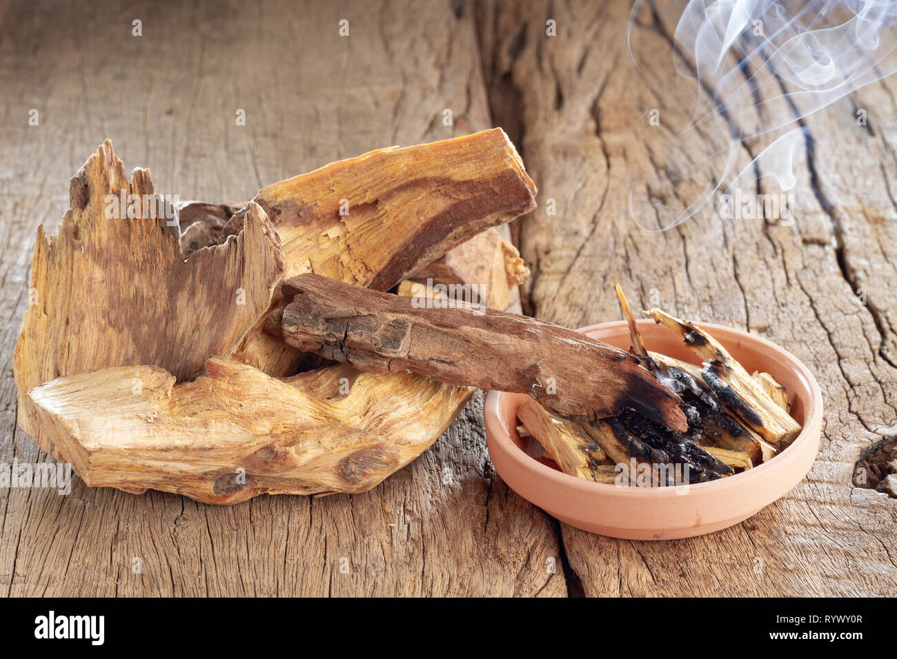 Sacred wood "palo santo" - Bursera graveolens,on rustic wood background ...