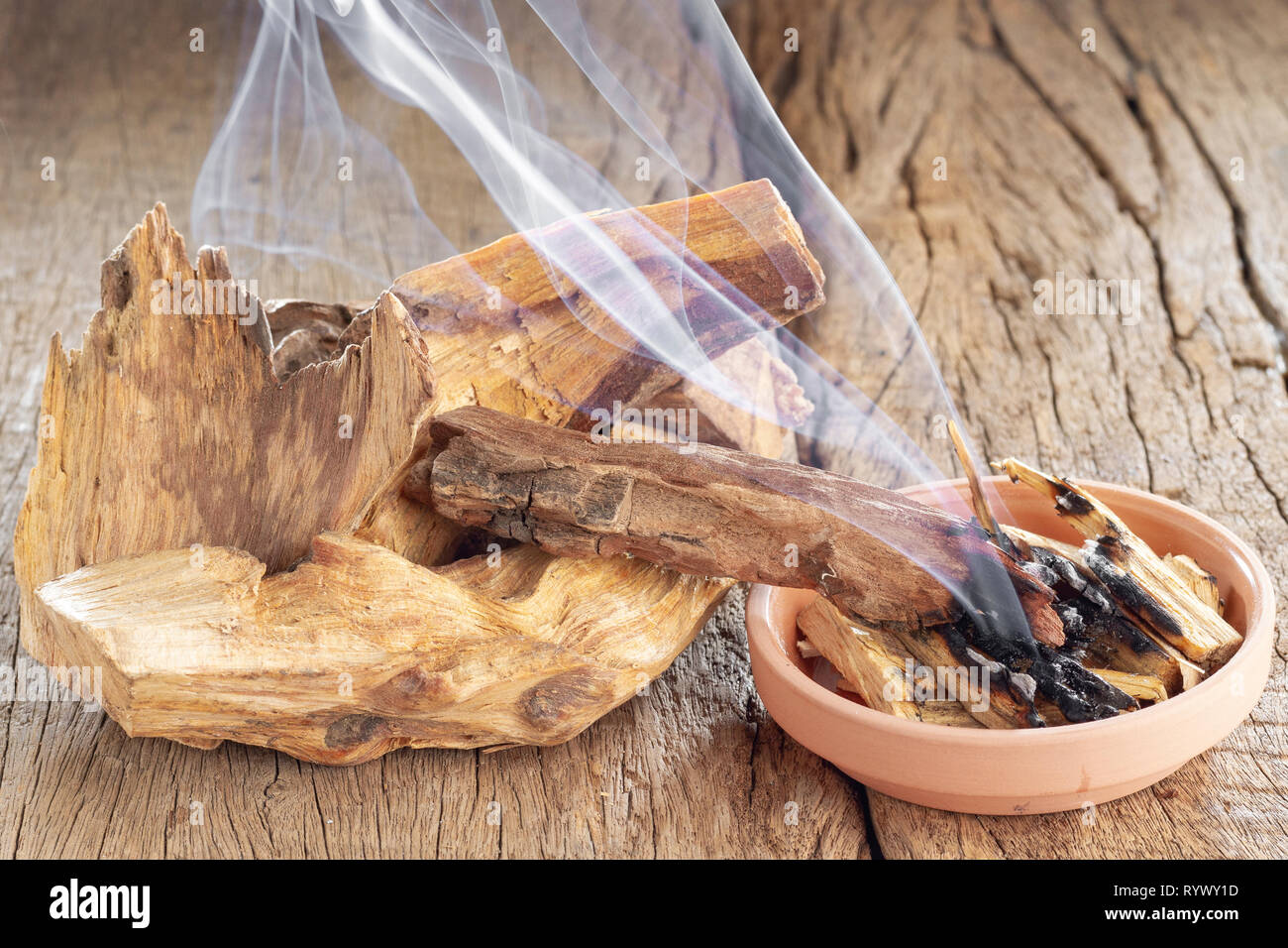 Sacred wood "palo santo" - Bursera graveolens,on rustic wood background ...