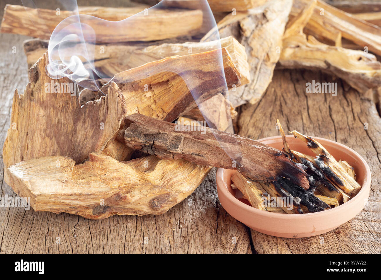 Sacred wood "palo santo" - Bursera graveolens,on rustic wood background ...