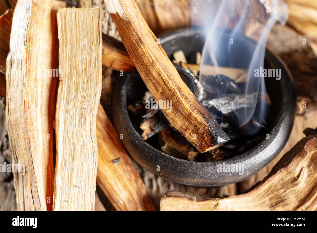 Sacred wood "palo santo" - Bursera graveolens,on rustic wood background ...