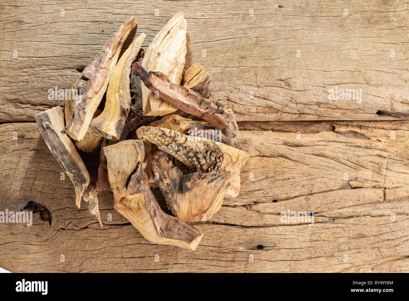 Sacred wood "palo santo" - Bursera graveolens,on rustic wood background ...