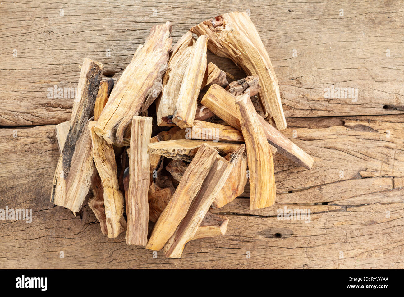 Sacred wood "palo santo" - Bursera graveolens,on rustic wood background ...
