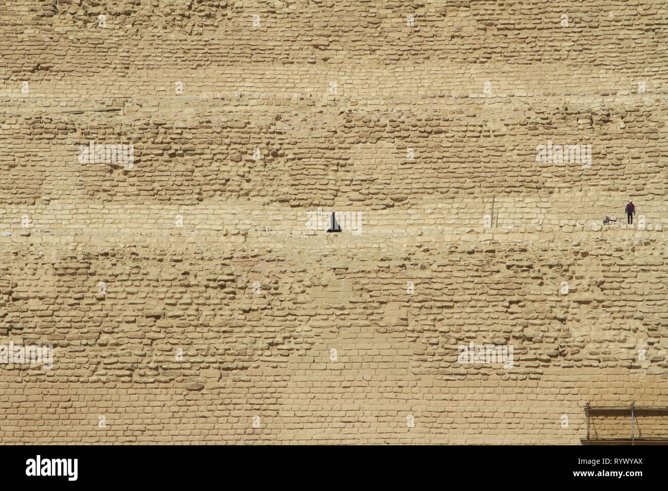 Restoration workers on the steps of the Stepped Pyramid of Djoser ...