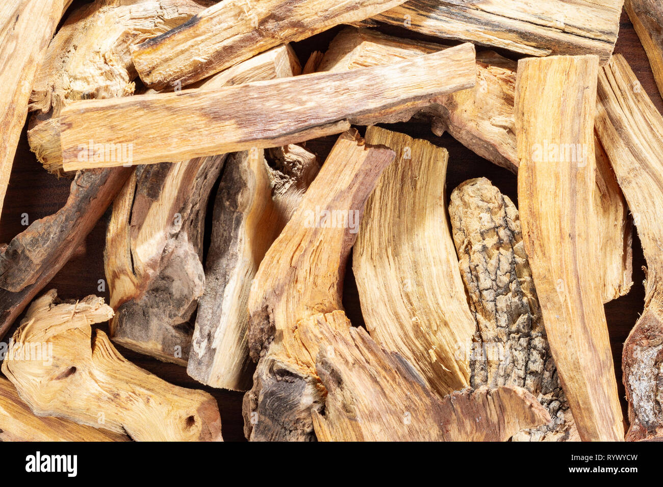 Sacred wood "palo santo" - Bursera graveolens,on rustic wood background ...