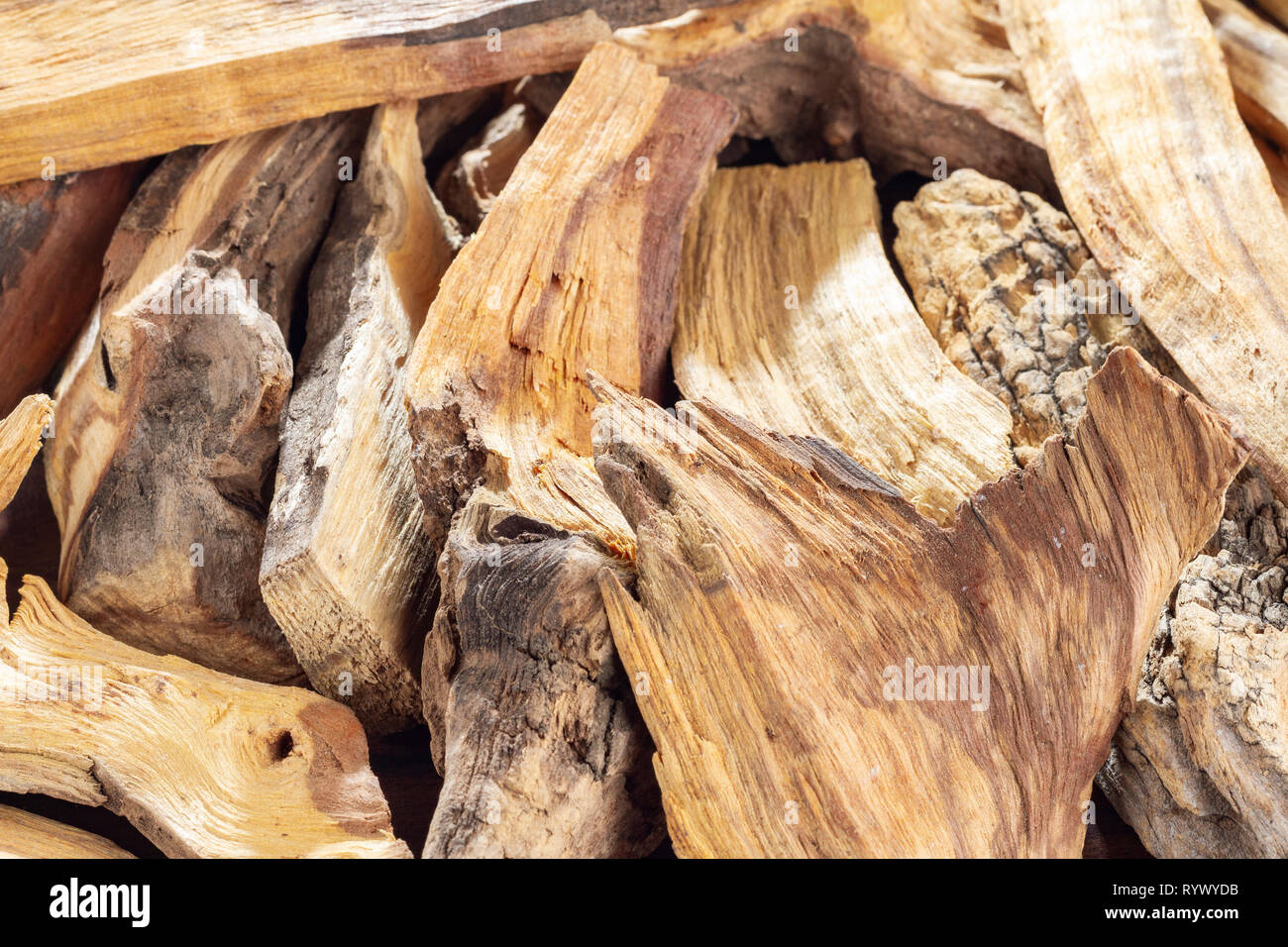 Sacred wood "palo santo" - Bursera graveolens,on rustic wood background ...