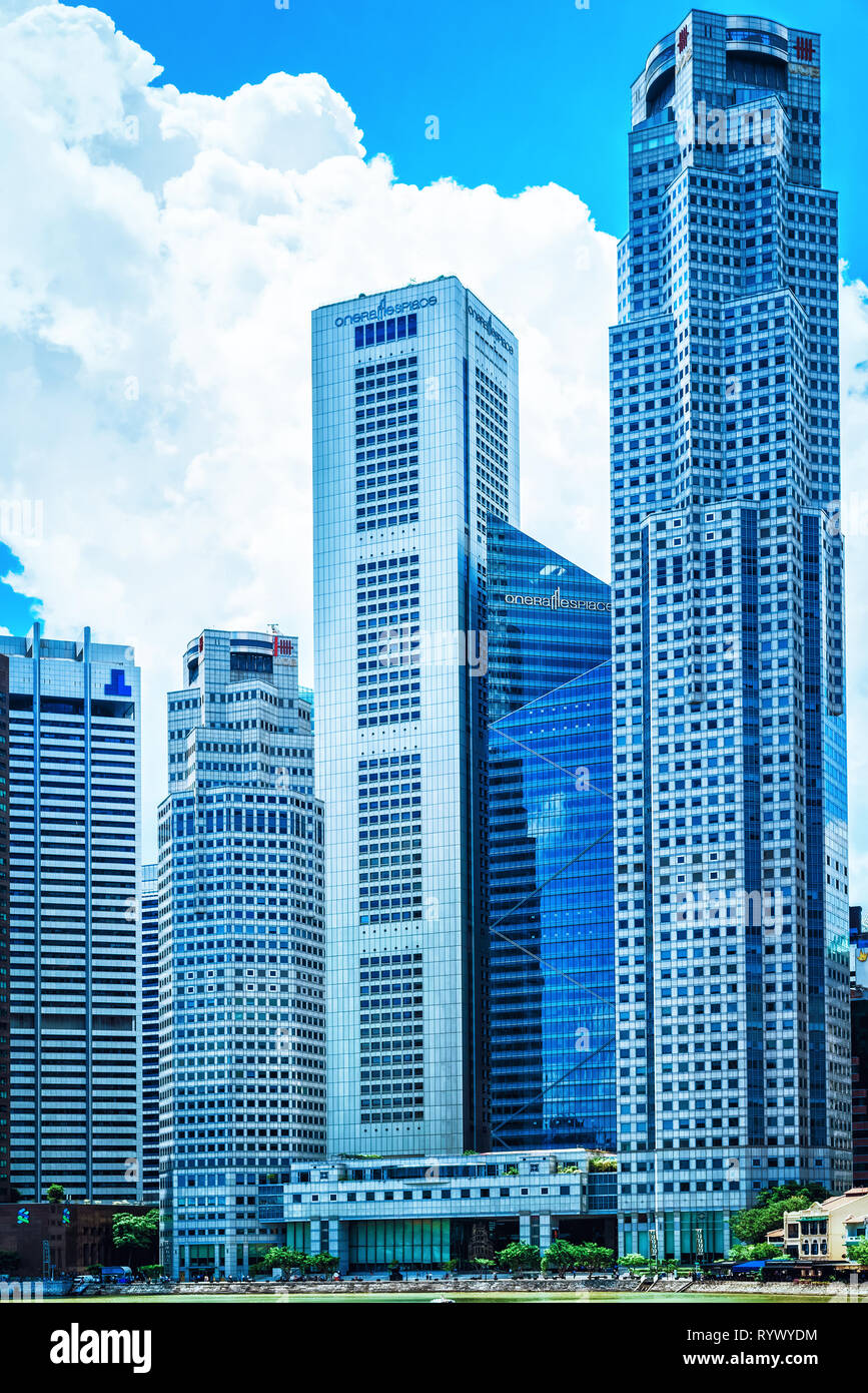 Singapore, Singapore - March 1, 2016: One Raffles Place and UOB Plaza ...