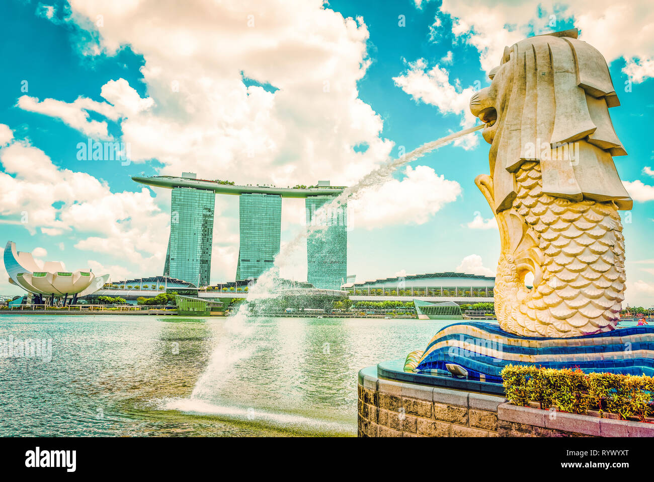 Singapore, Singapore - March 1, 2016: Merlion statue sprays the water ...