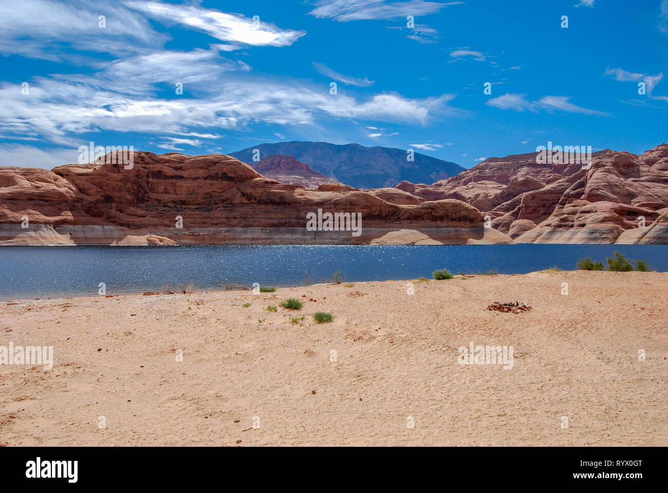 A warm summer afternoon at Lake Powell, Utah. Large red, orange ...