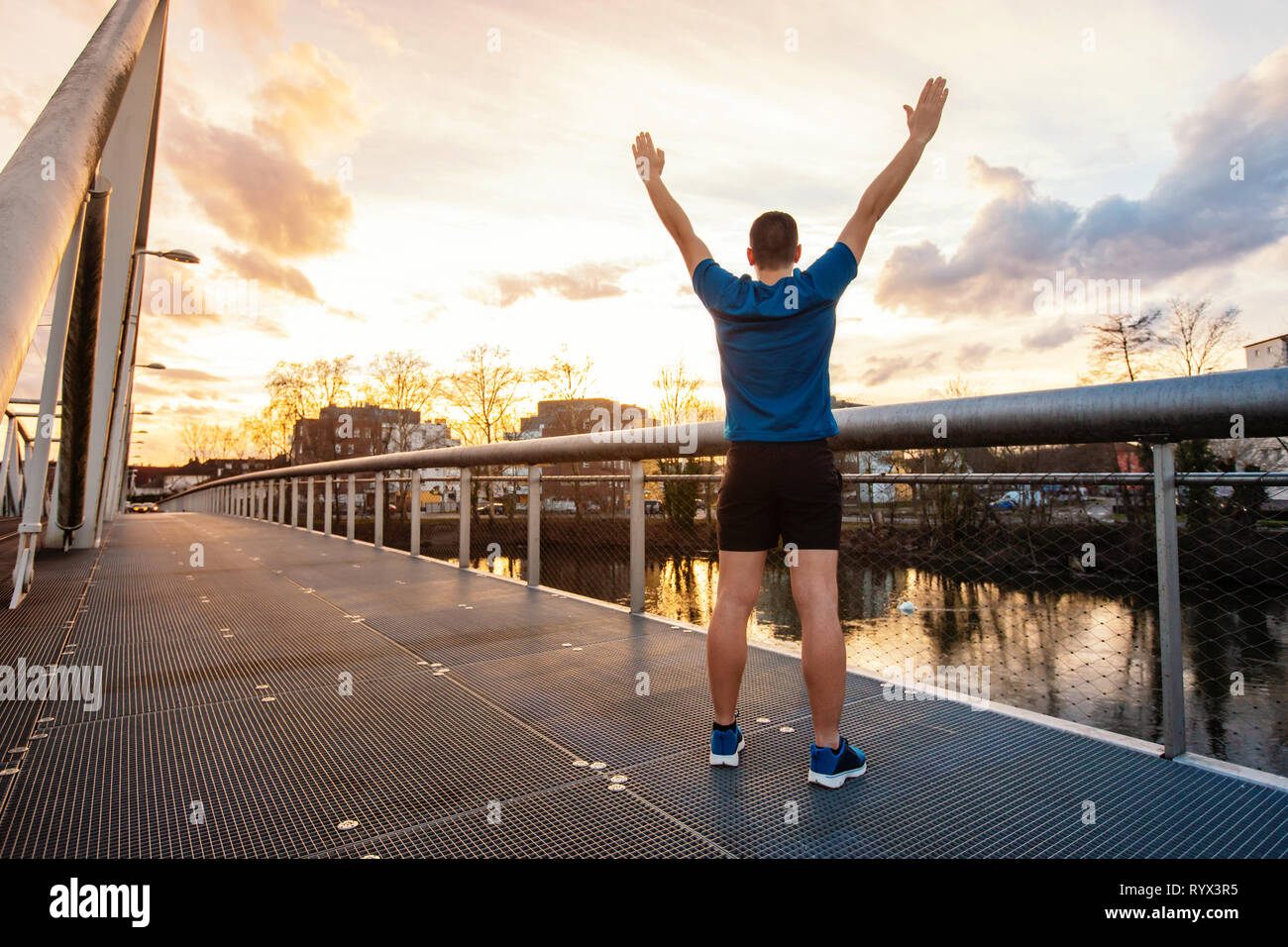 Silhouette man celebrating on city hi-res stock photography and images ...