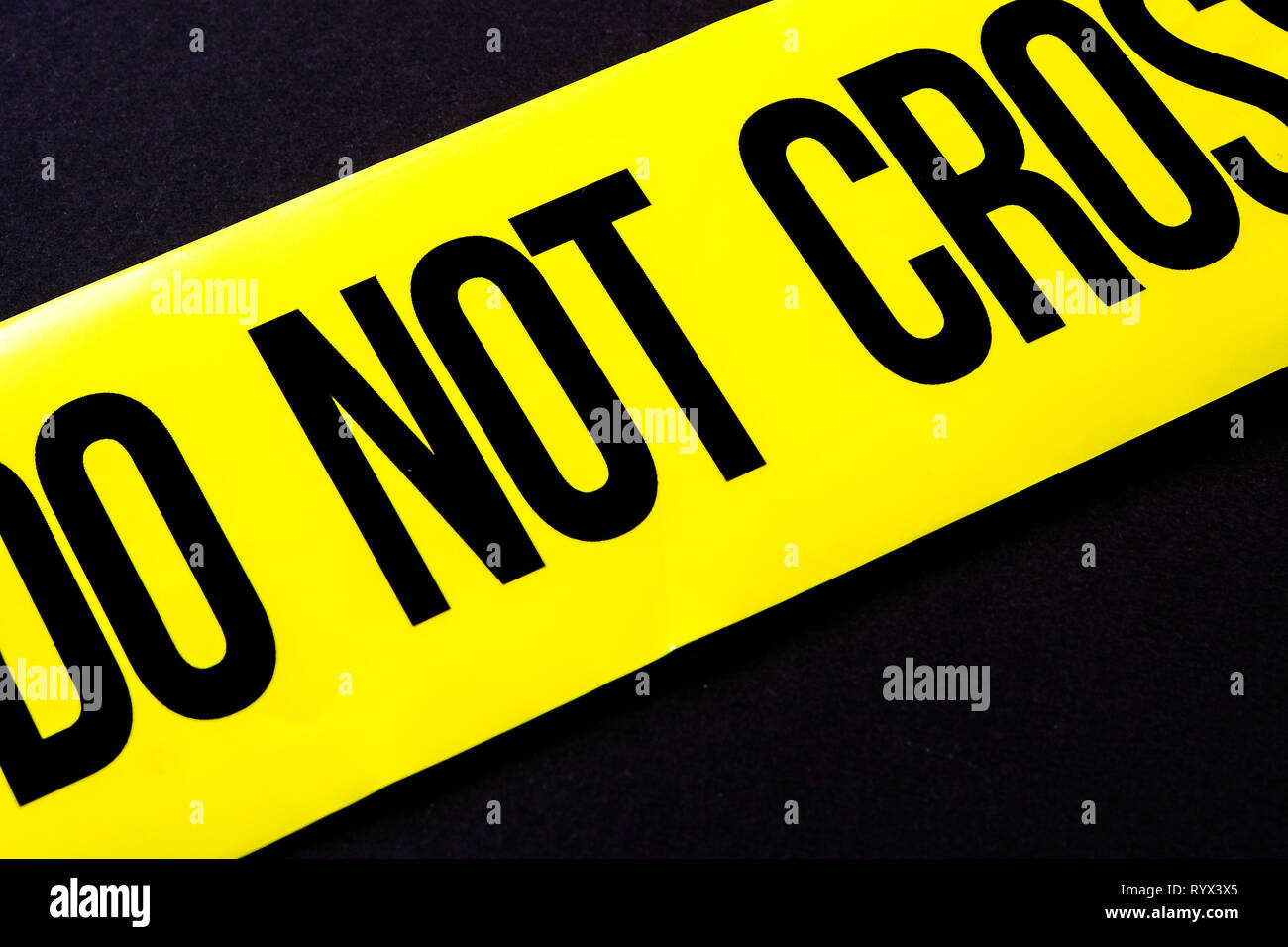 do not cross line with little miniature figurines standing in front of ...