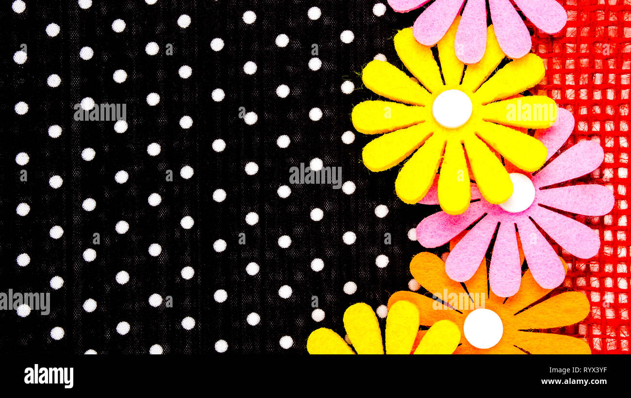 gift card with black dotted background and red ribbon band with many ...