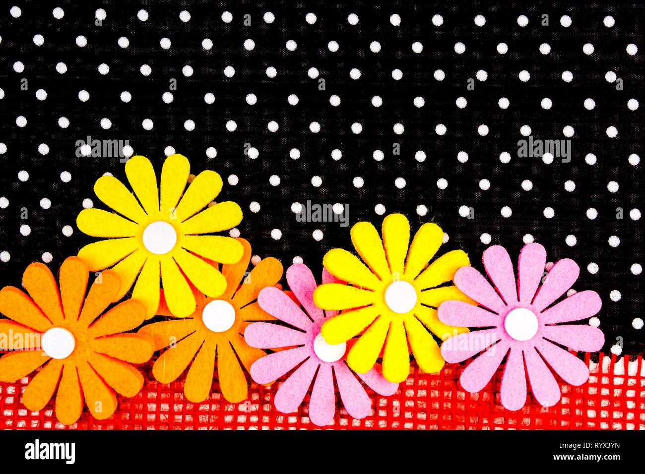 gift card with black dotted background and red ribbon band with many ...