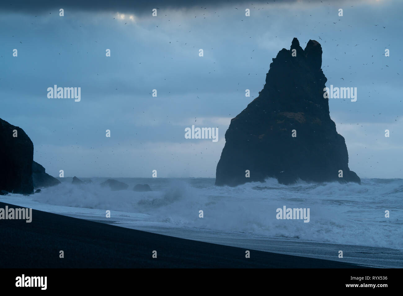 Rock spire of Reynisdrangur, coast of Reynisfjara close to Vik, Iceland ...