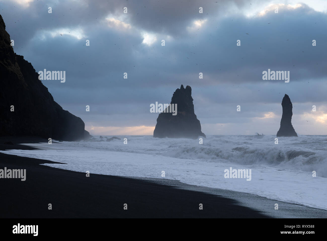 Rock spire of Reynisdrangur, coast of Reynisfjara close to Vik, Iceland ...