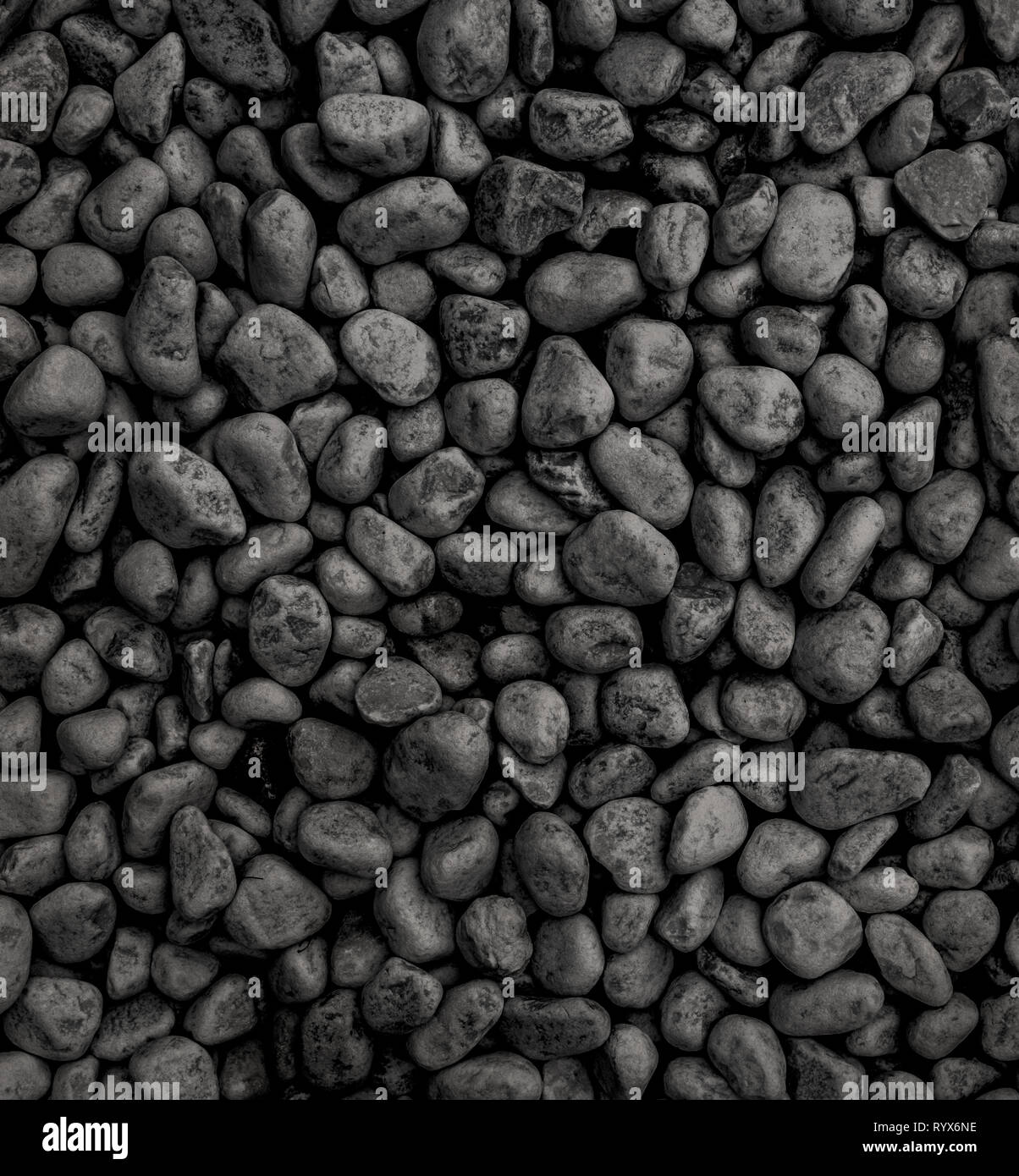 black stone background, many dark pebble stones Stock Photo - Alamy
