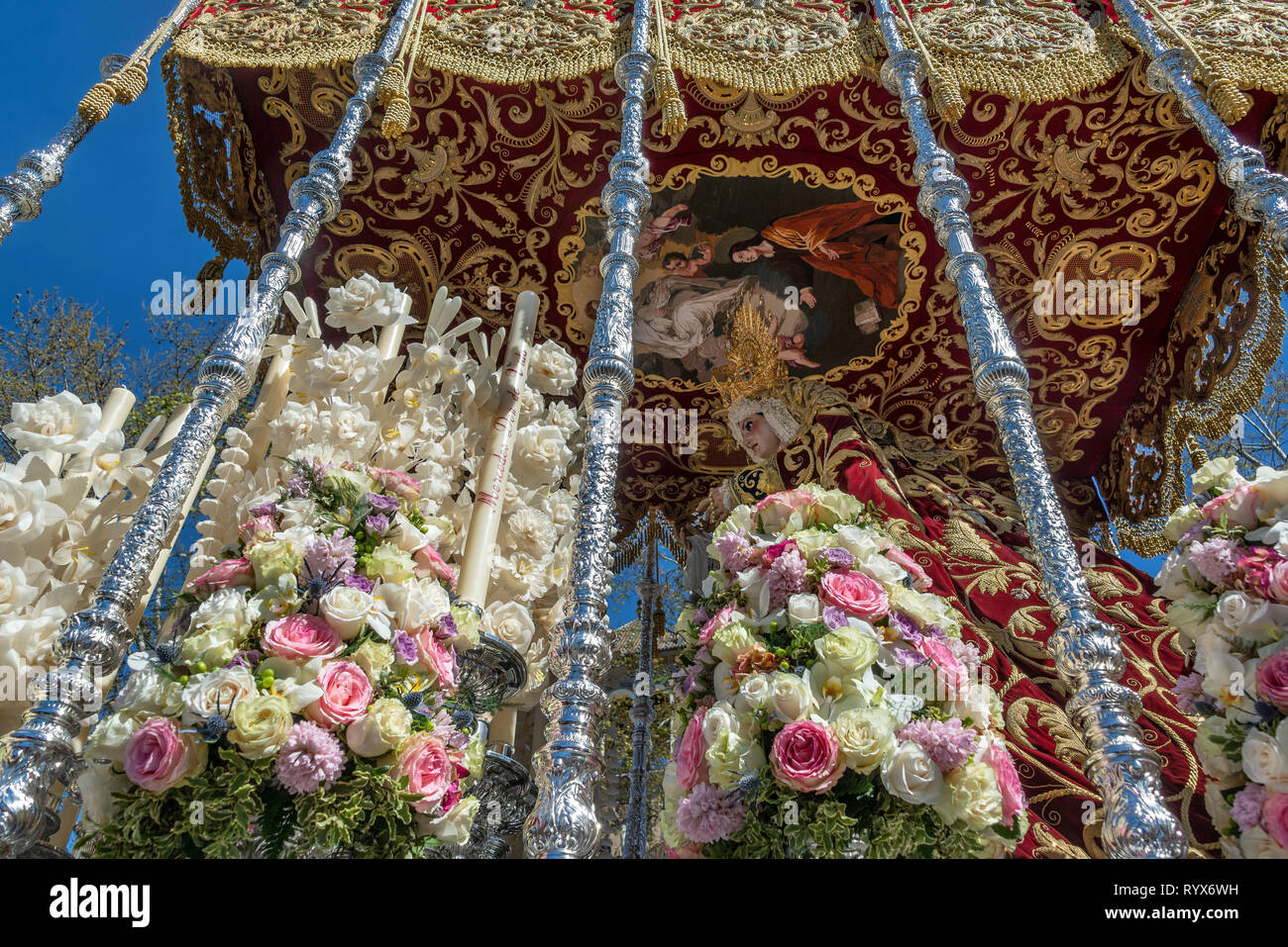 Float carrying a statue of the Virgin Mary during a procession during ...