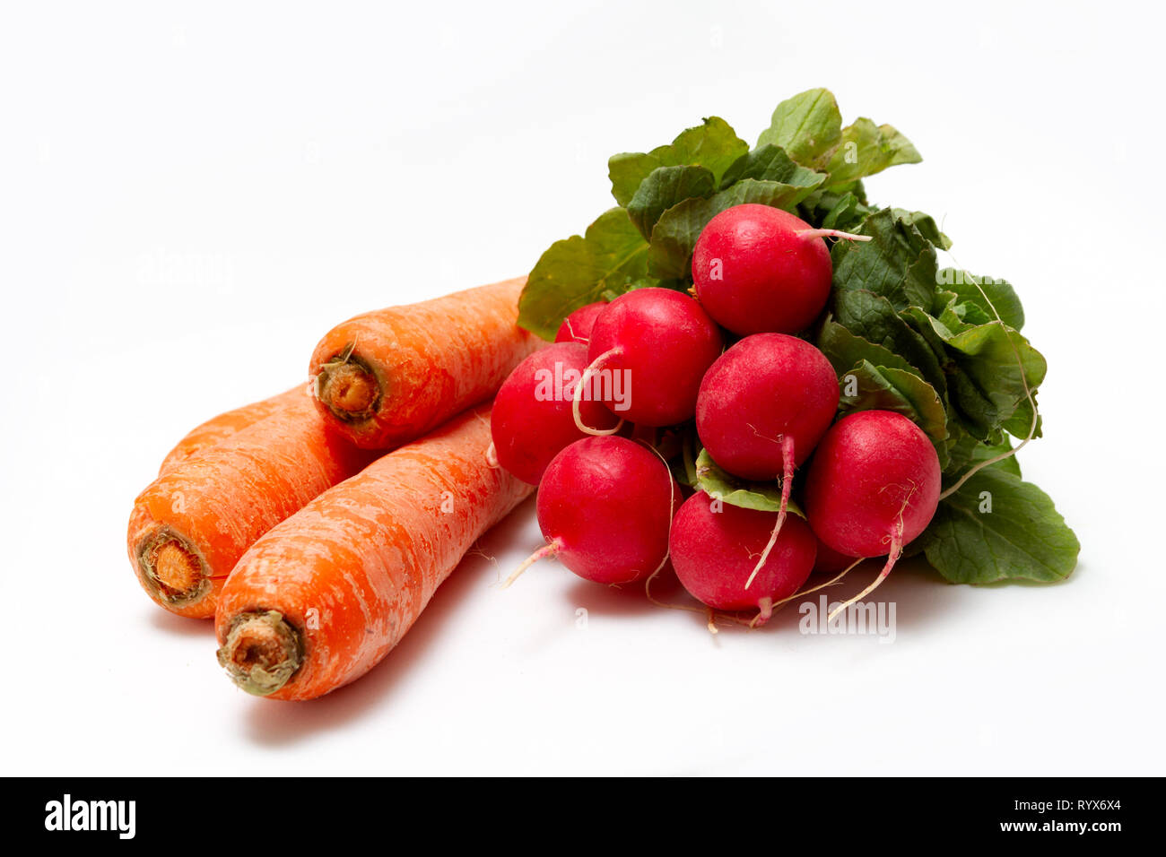 Organic red radishes carrots hi-res stock photography and images - Alamy
