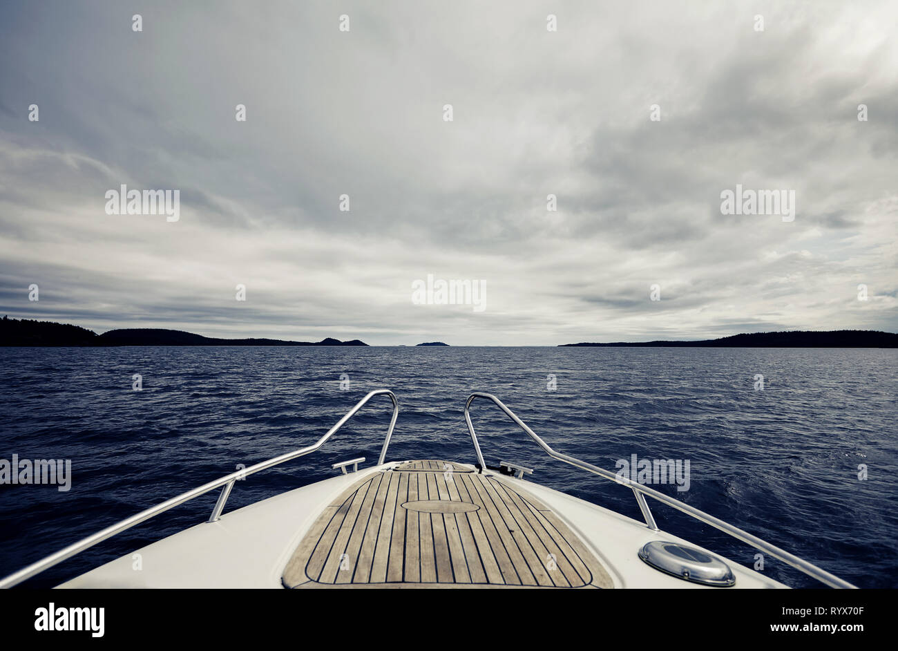 Motor boat nose against the background of water and a heavy sky Stock ...