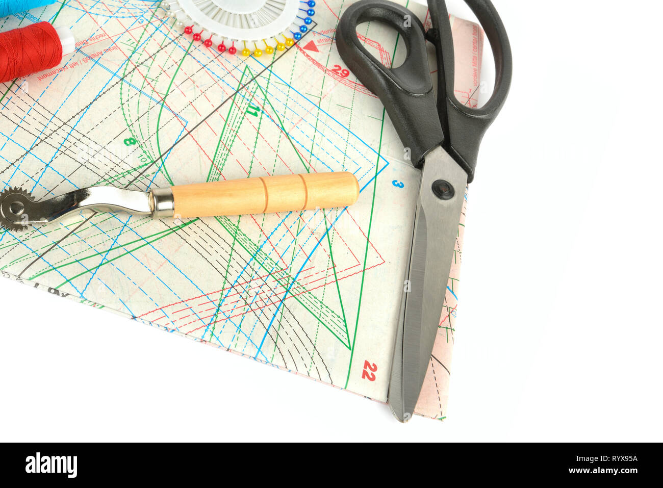 Sewing accessories and paper pattern isolated on white background. Flat ...