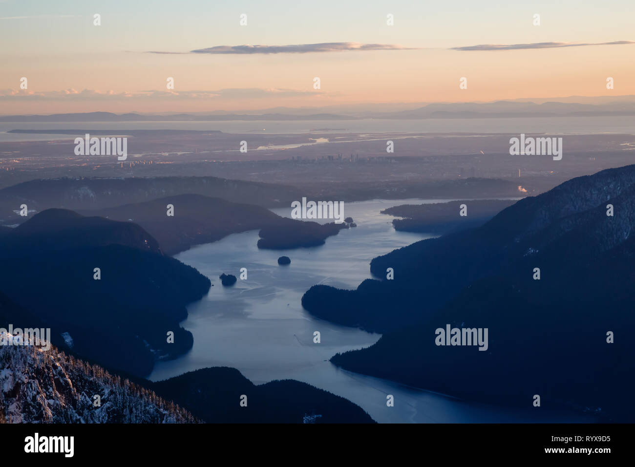 Aerial view of Deep Cove and Indian Arm during a sunny winter sunset ...
