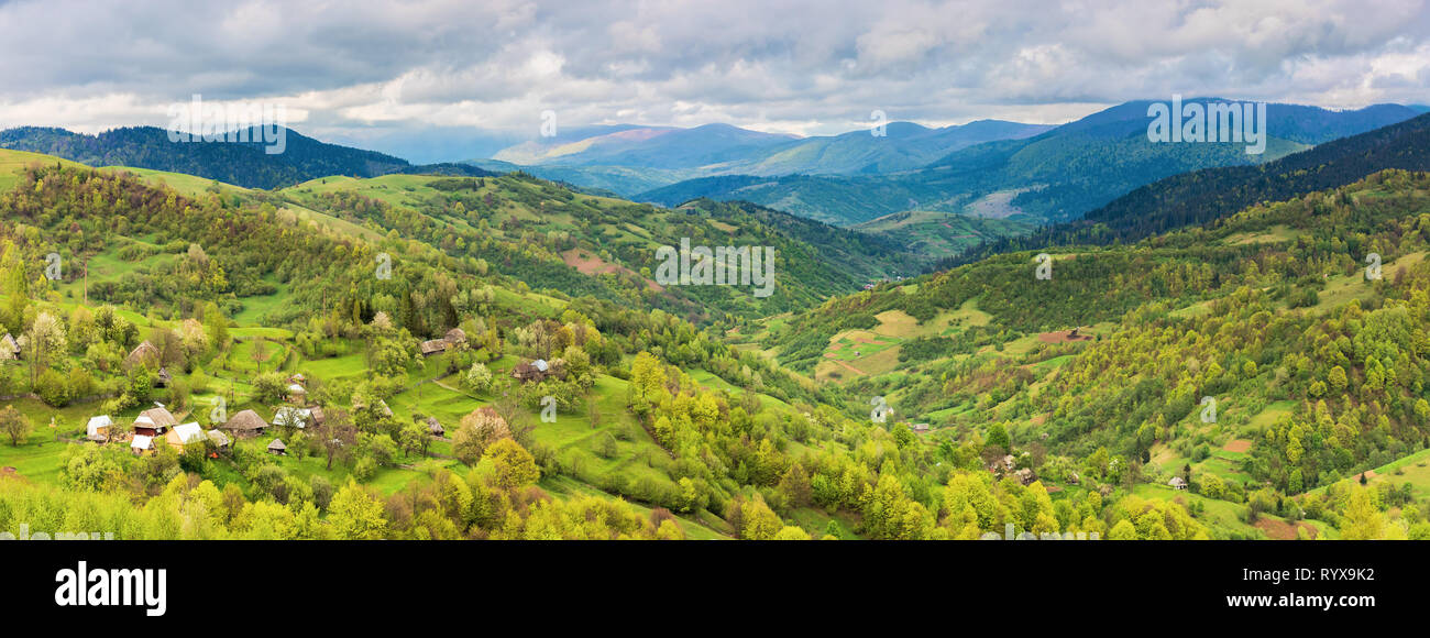 panorama of mountainous countryside in springtime. village on the ...