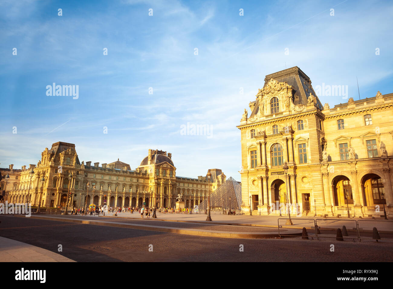 Famous French art museum the Louvre Palace and the pyramid in Paris at ...