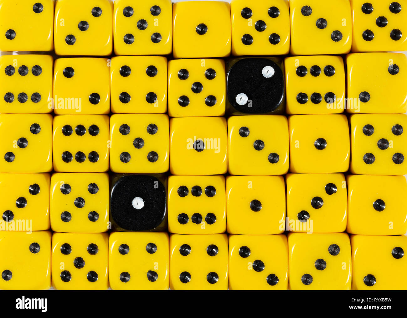 Two dice yellow hi-res stock photography and images - Alamy