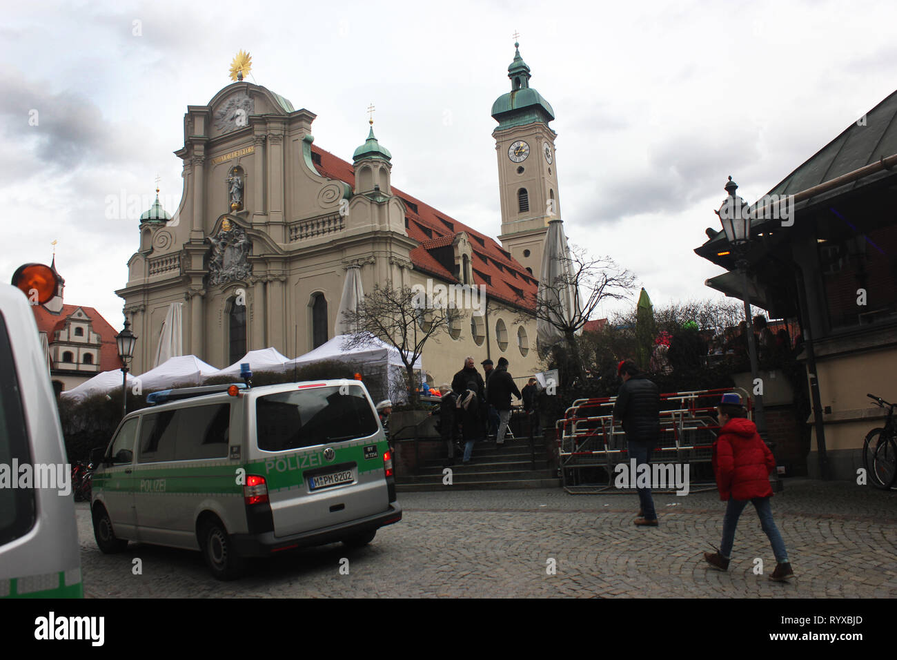 German green-white police car limousine parking in the pedestrian area ...