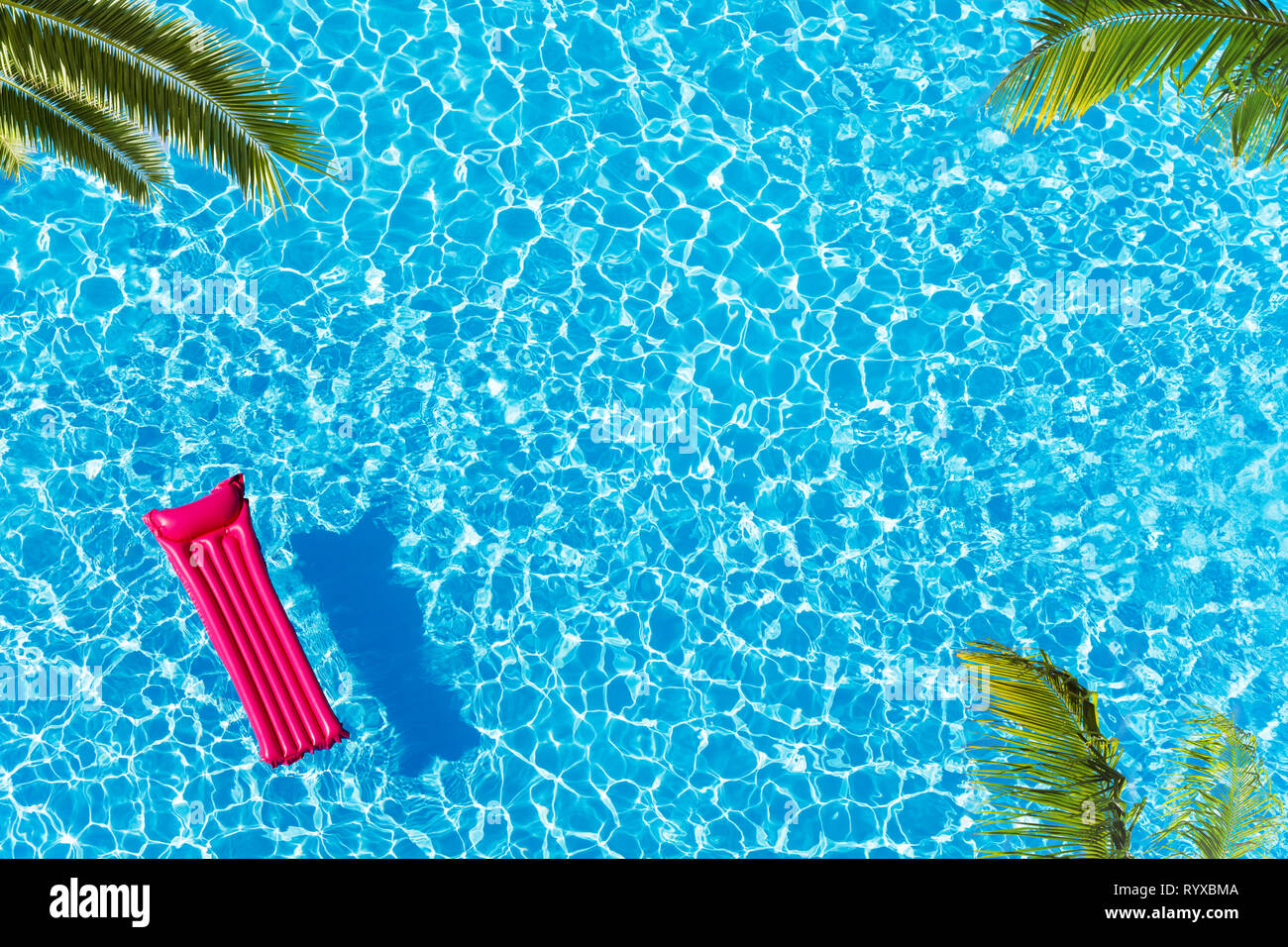 Vacation pool hotel view from above with ping matrass floating, water ...
