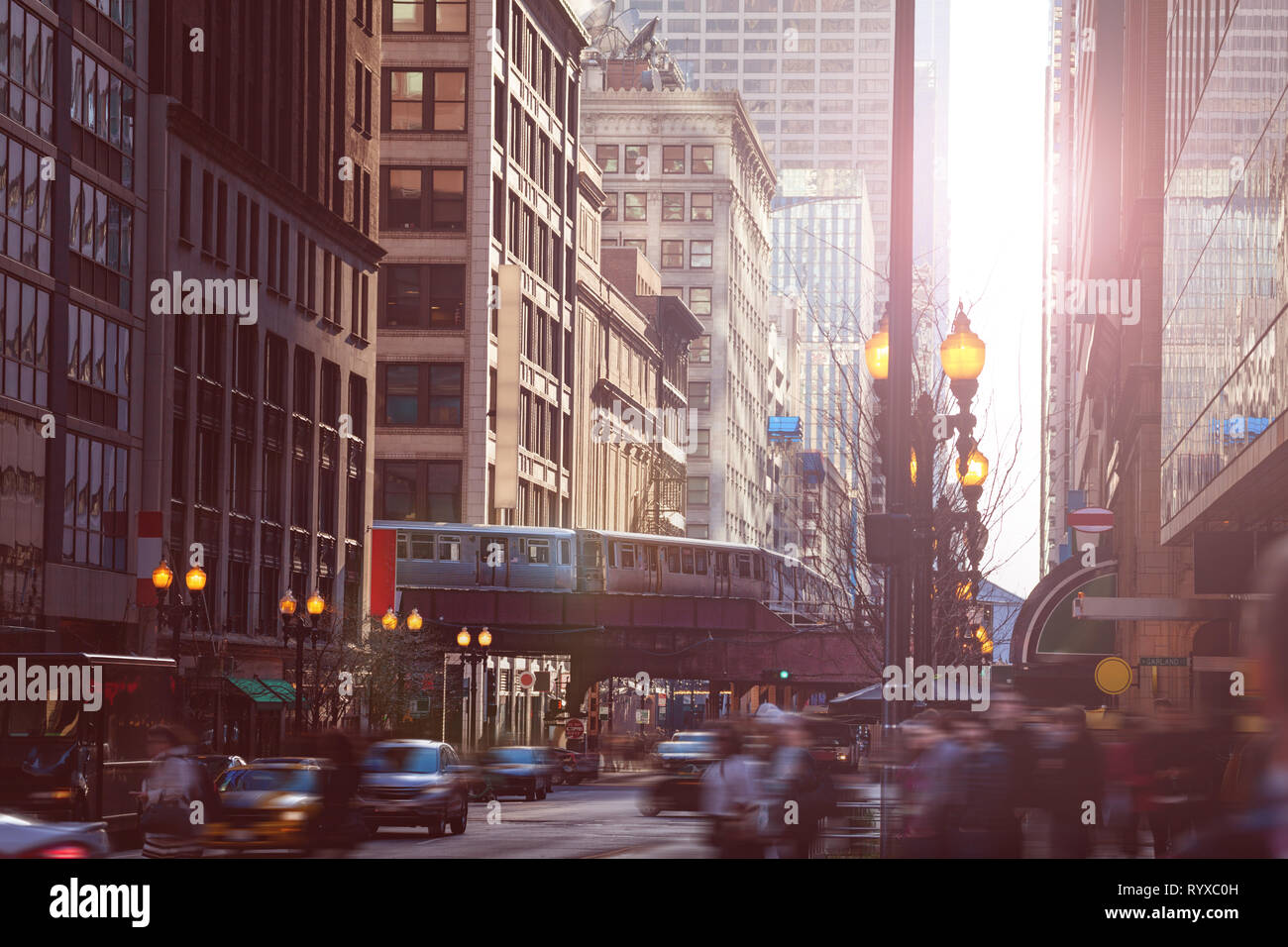 Busy street in city of Chicago downtown with metro line and train ...