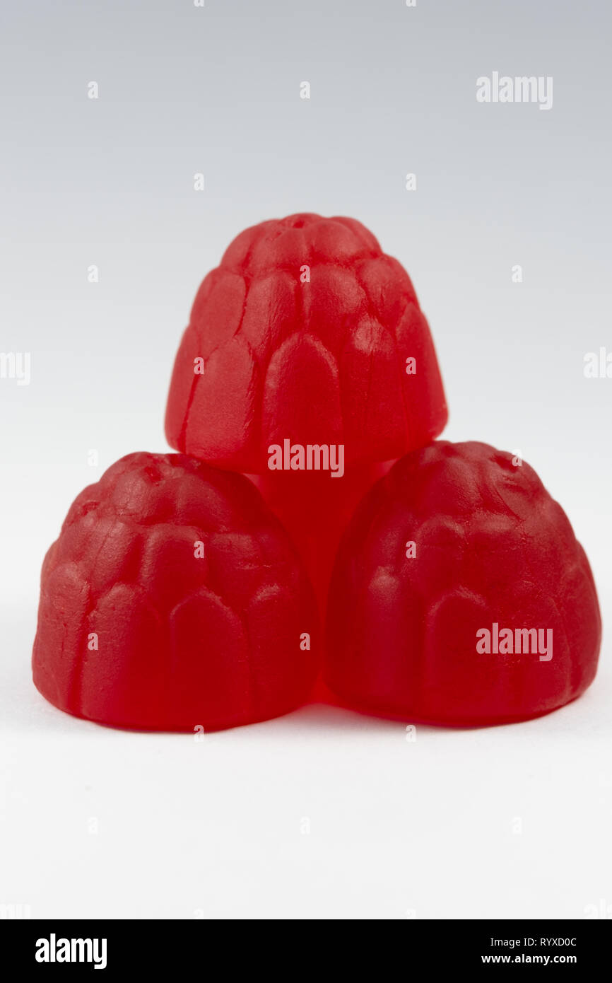 Pyramid of raspberries on white background Stock Photo - Alamy