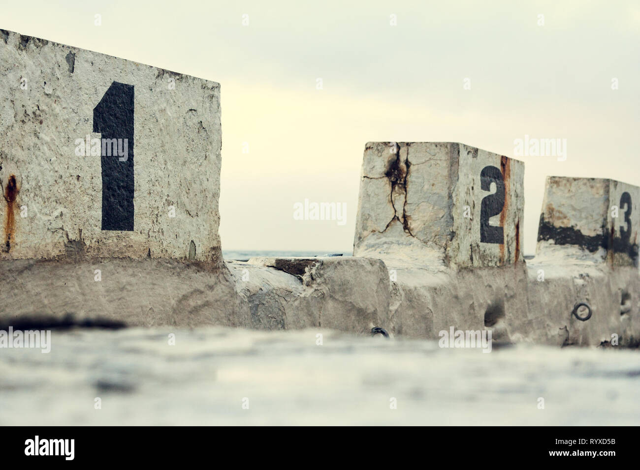 Concrete diving blocks at the Newcastle Ocean Baths Stock Photo - Alamy