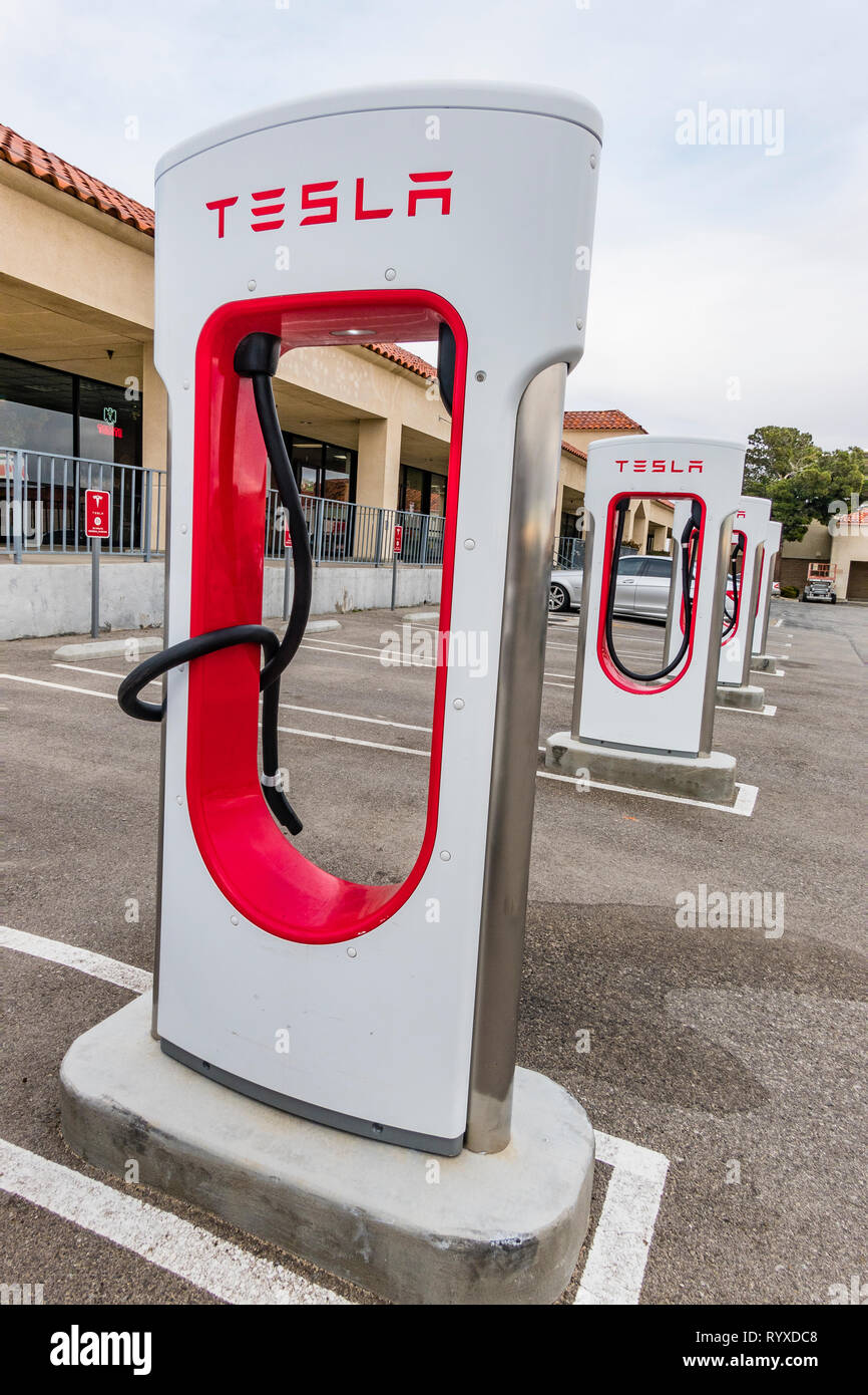 A Tesla Supercharger that is broken and consequently the charging cord ...
