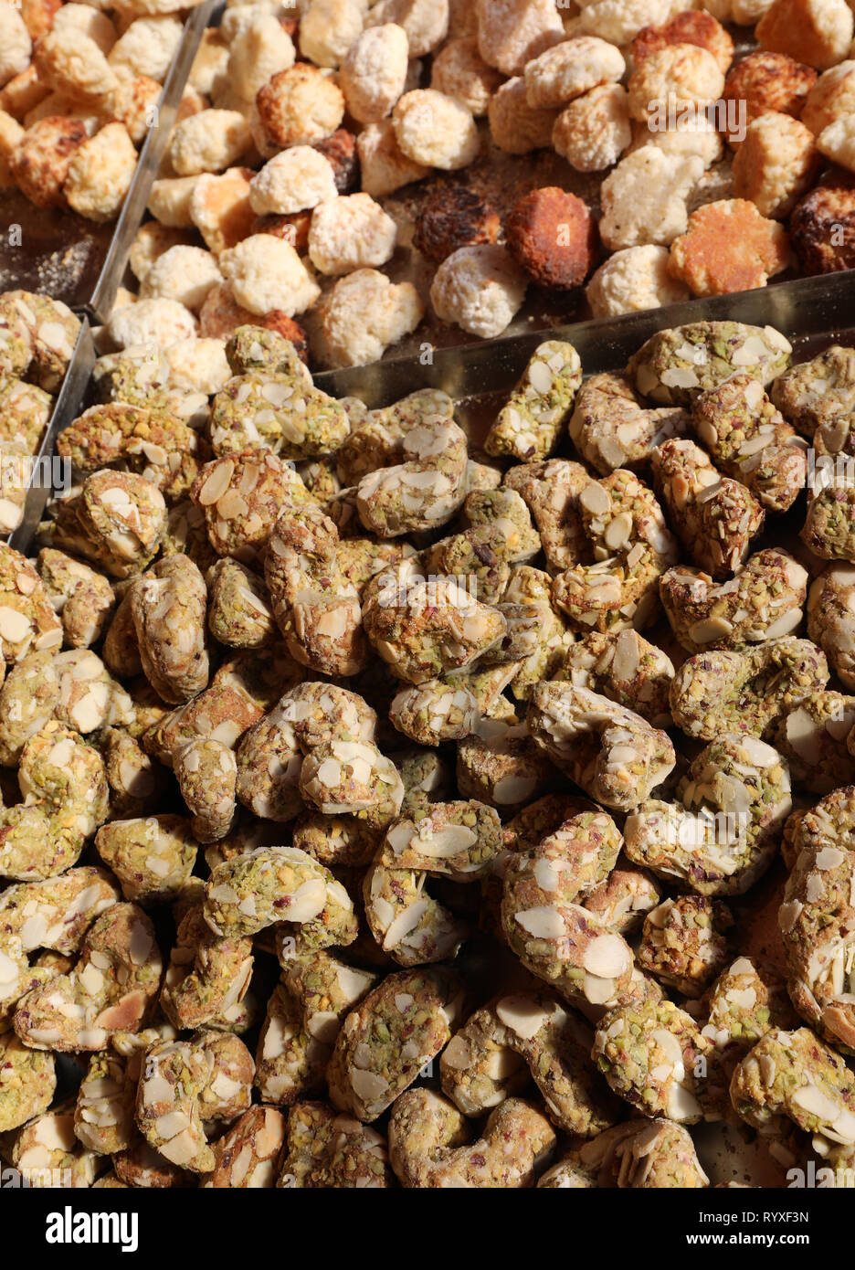 background of dried biscuits made with sugar almonds and pistachios for ...