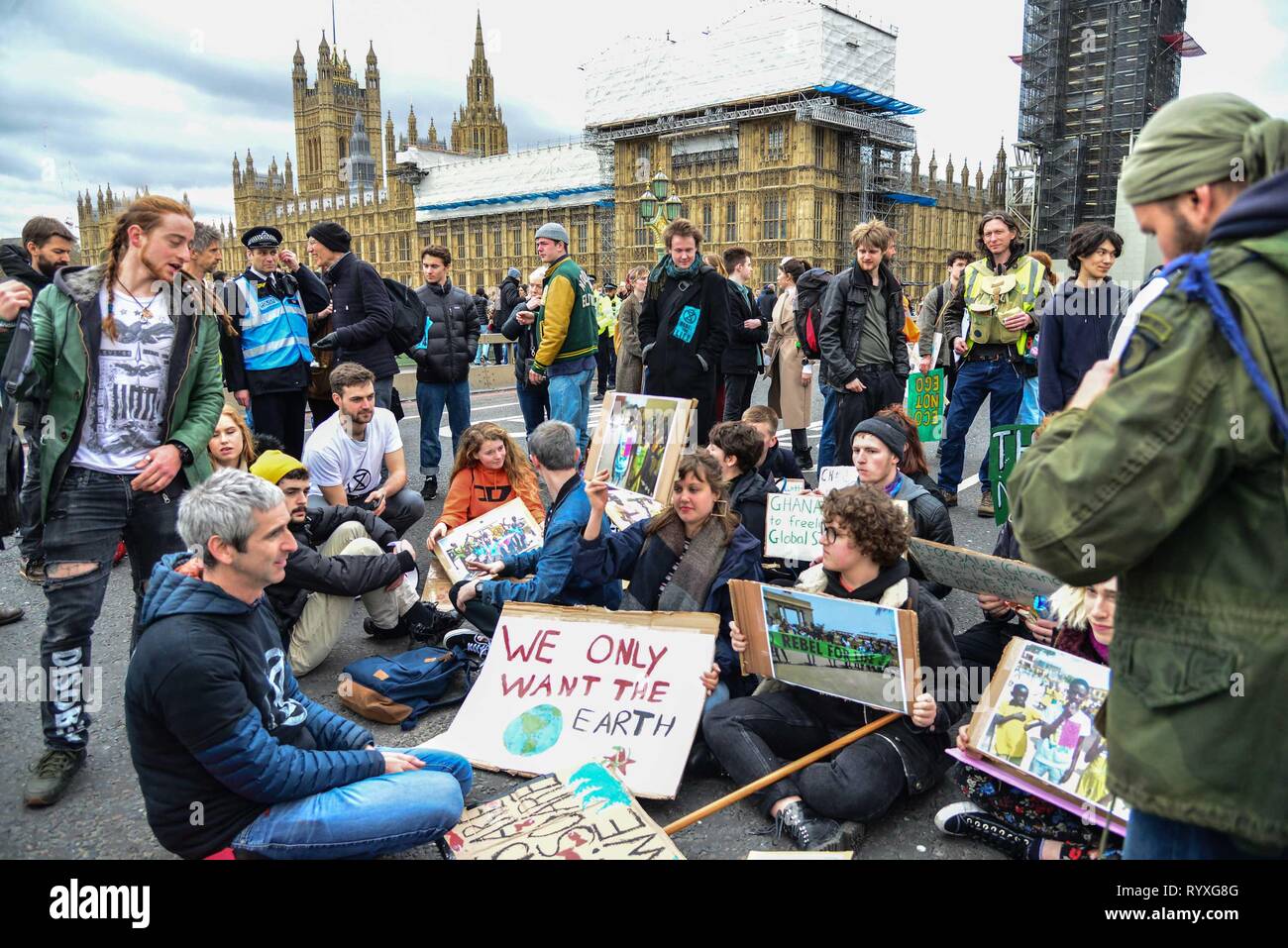 London, UK. 15th Mar, 2019. Sit down protest by student climate change ...