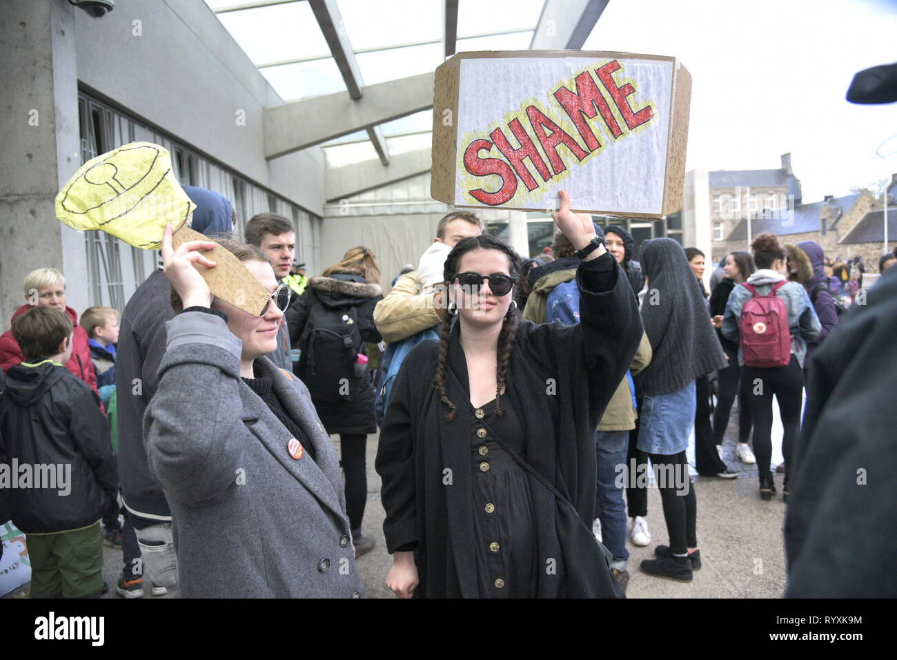 Edinburgh, Lothian, UK. 15th Mar, 2019. Two protesters are seen holding ...