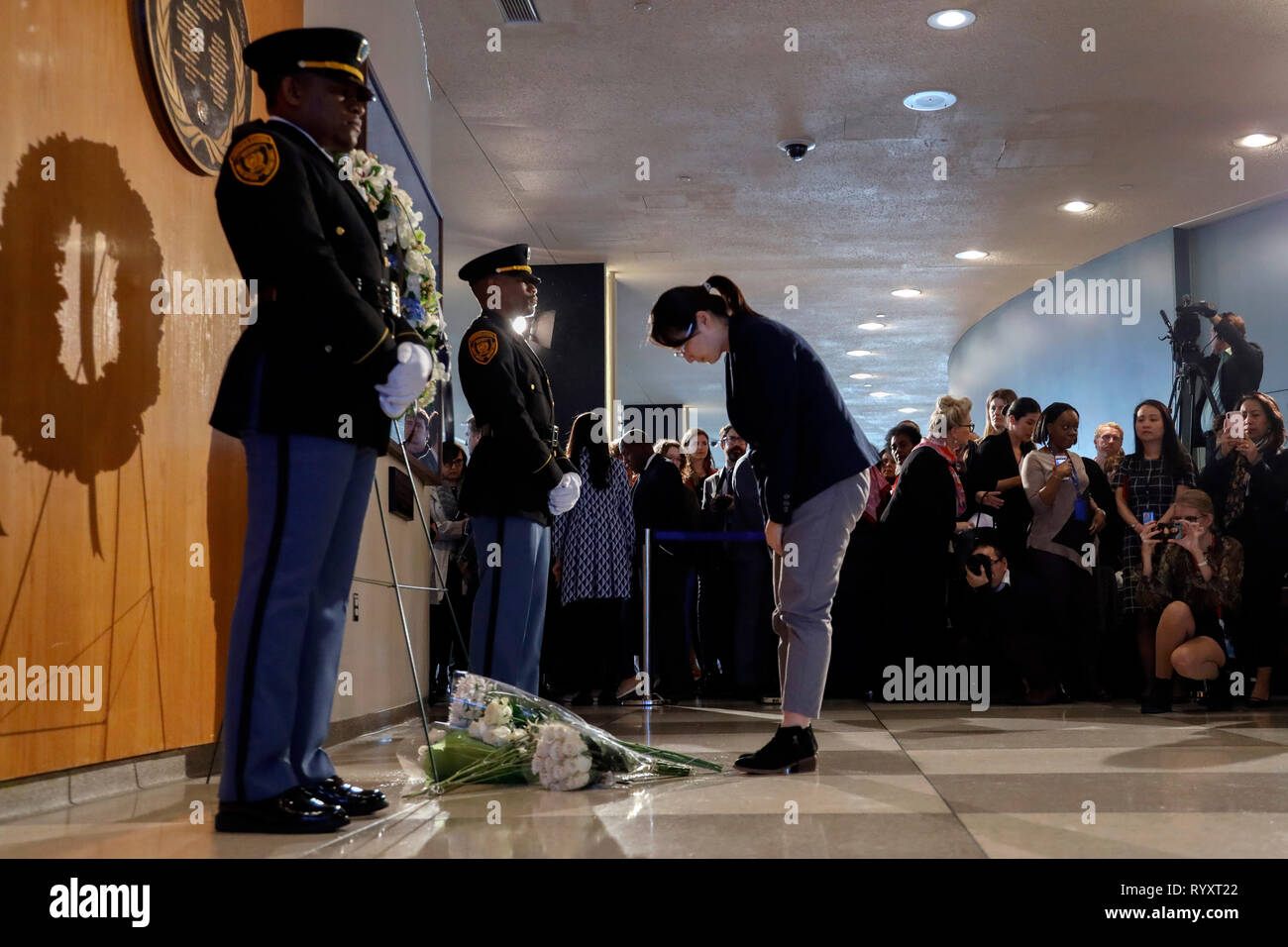 New York, USA. 15th March, 2019. A United Nations staff member bows ...