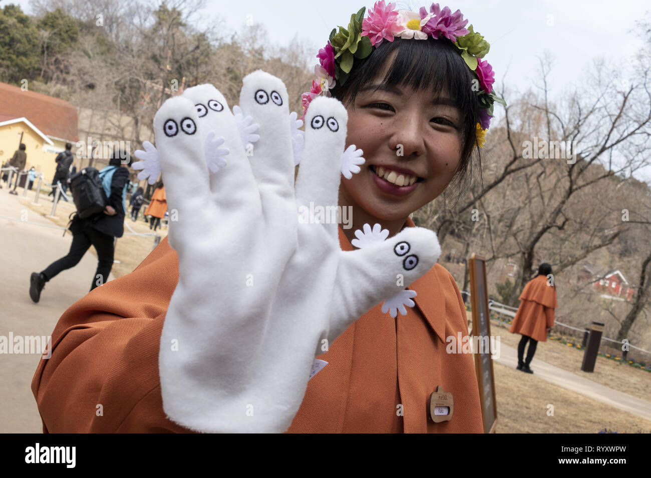 Saitama, Japan. 16th Mar, 2019. A member of staff shows a Moomin ...