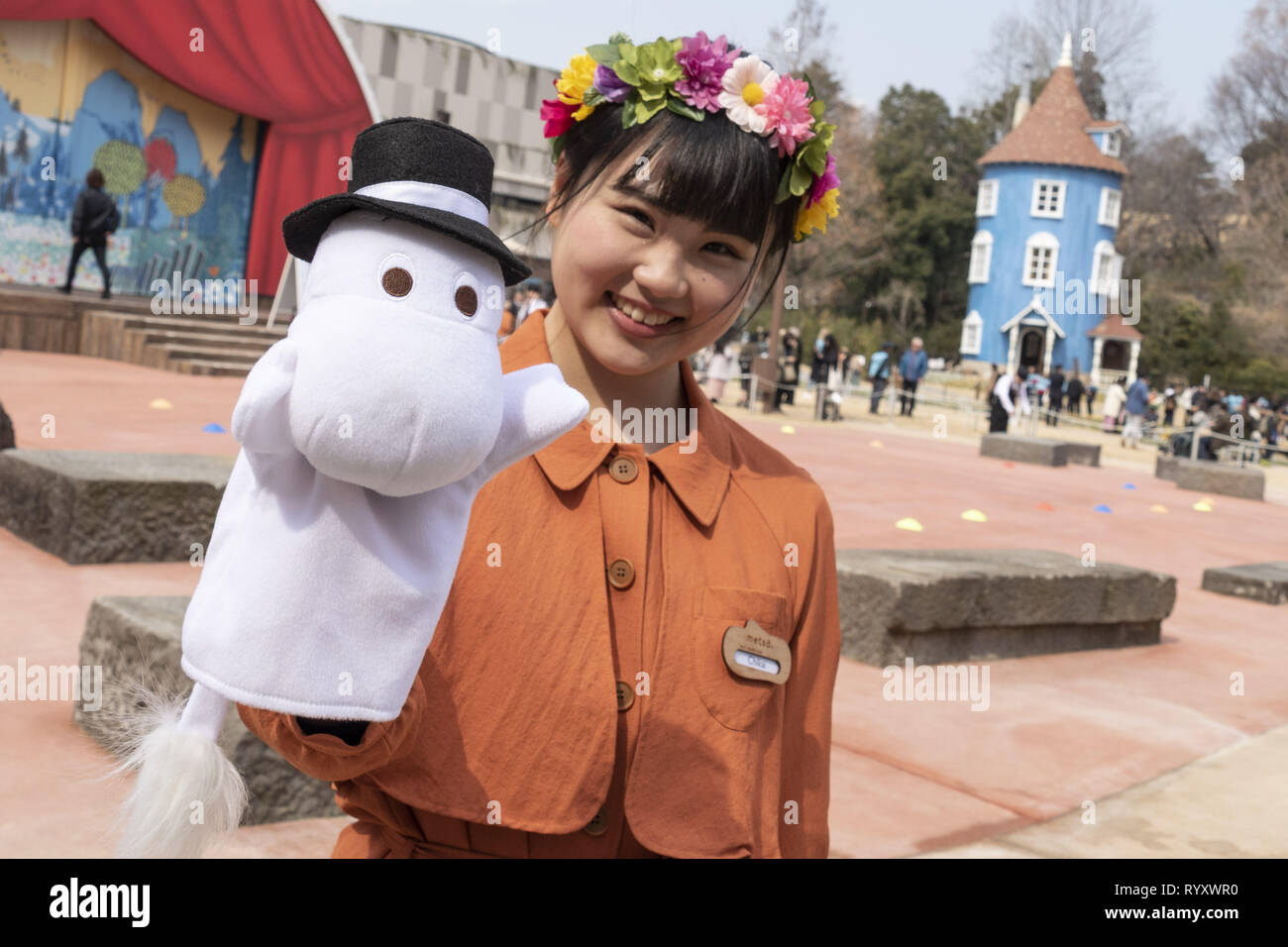 Saitama, Japan. 16th Mar, 2019. A member of staff shows a Moomin ...