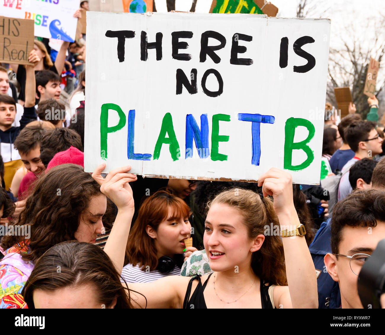 A girl seen holding a placard during the Youth Climate Strike protest ...